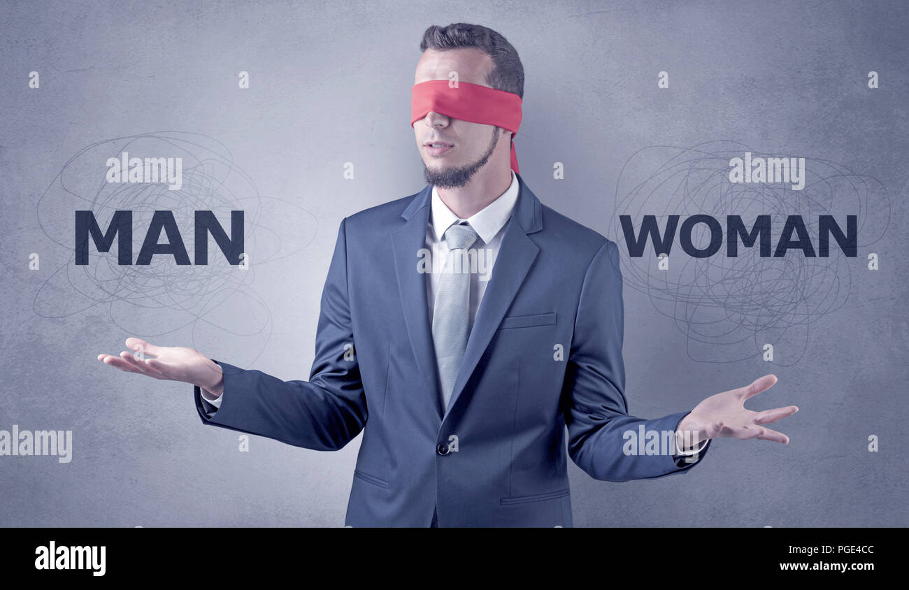 Covered eye indecisive businessman choosing between woman and man ...