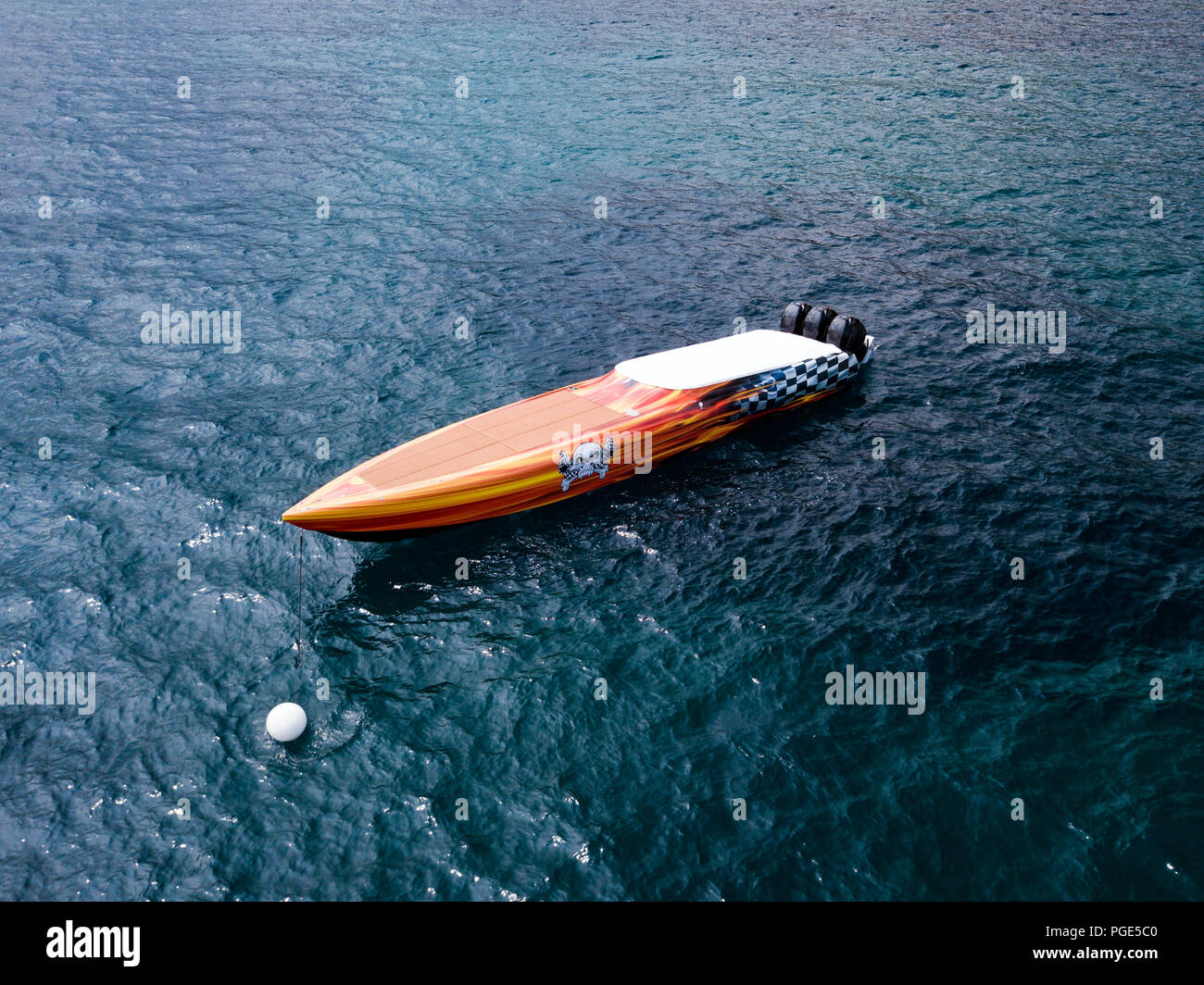 Aerial view of a beautiful orange racing boat sailing on a transparent ...