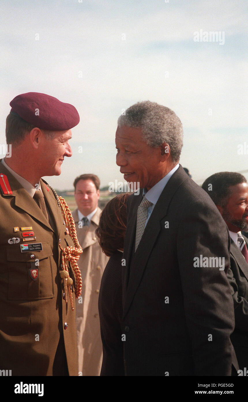 South Africa's President, Nelson Mandela, talks with other ...