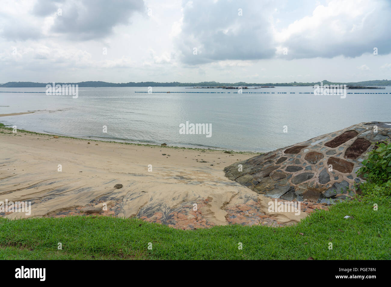 Singapore - july 8, 2018: Pasir Ris Park beach with fish farms Stock ...