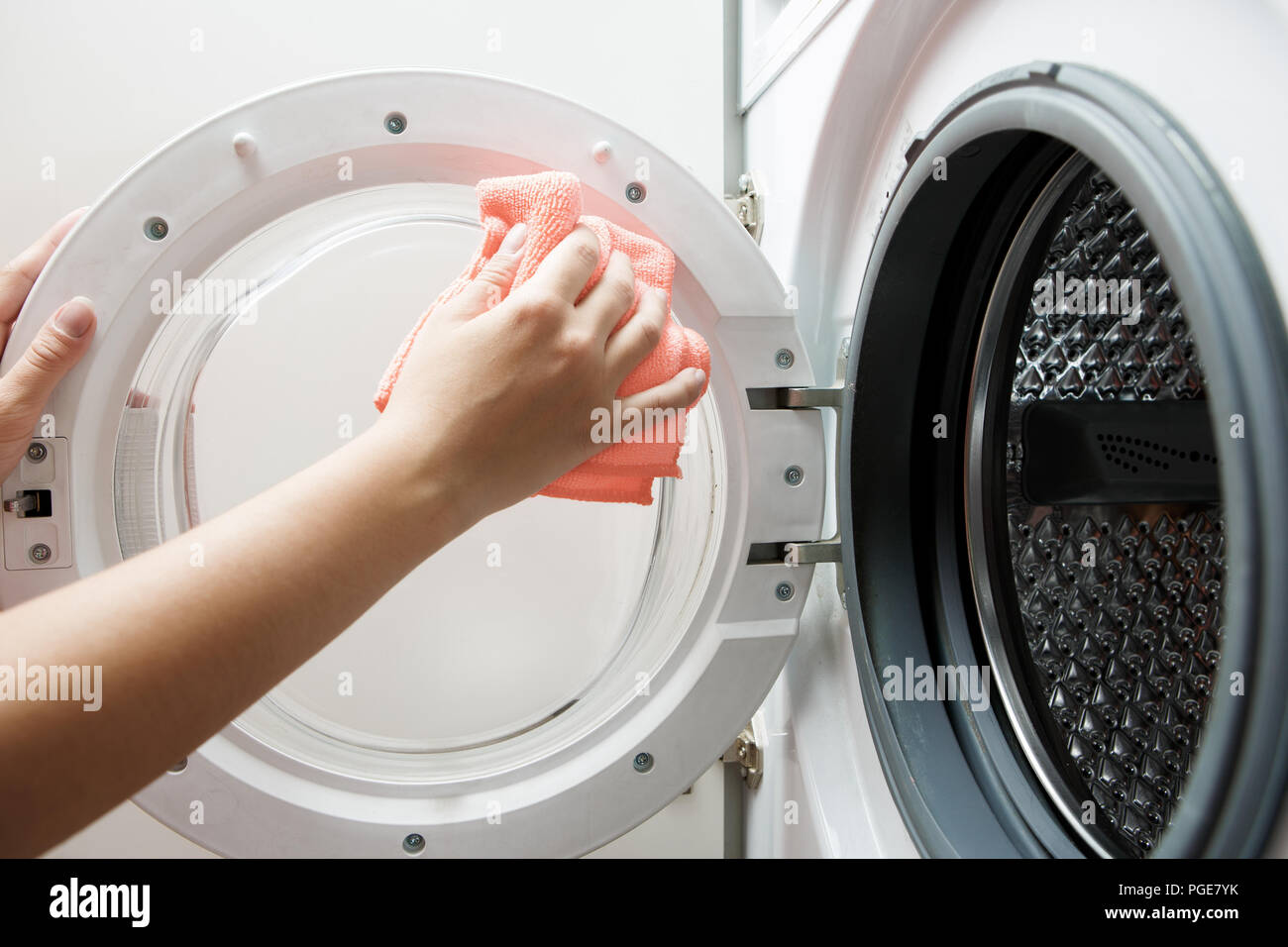 Woman washes laundry hi-res stock photography and images - Alamy