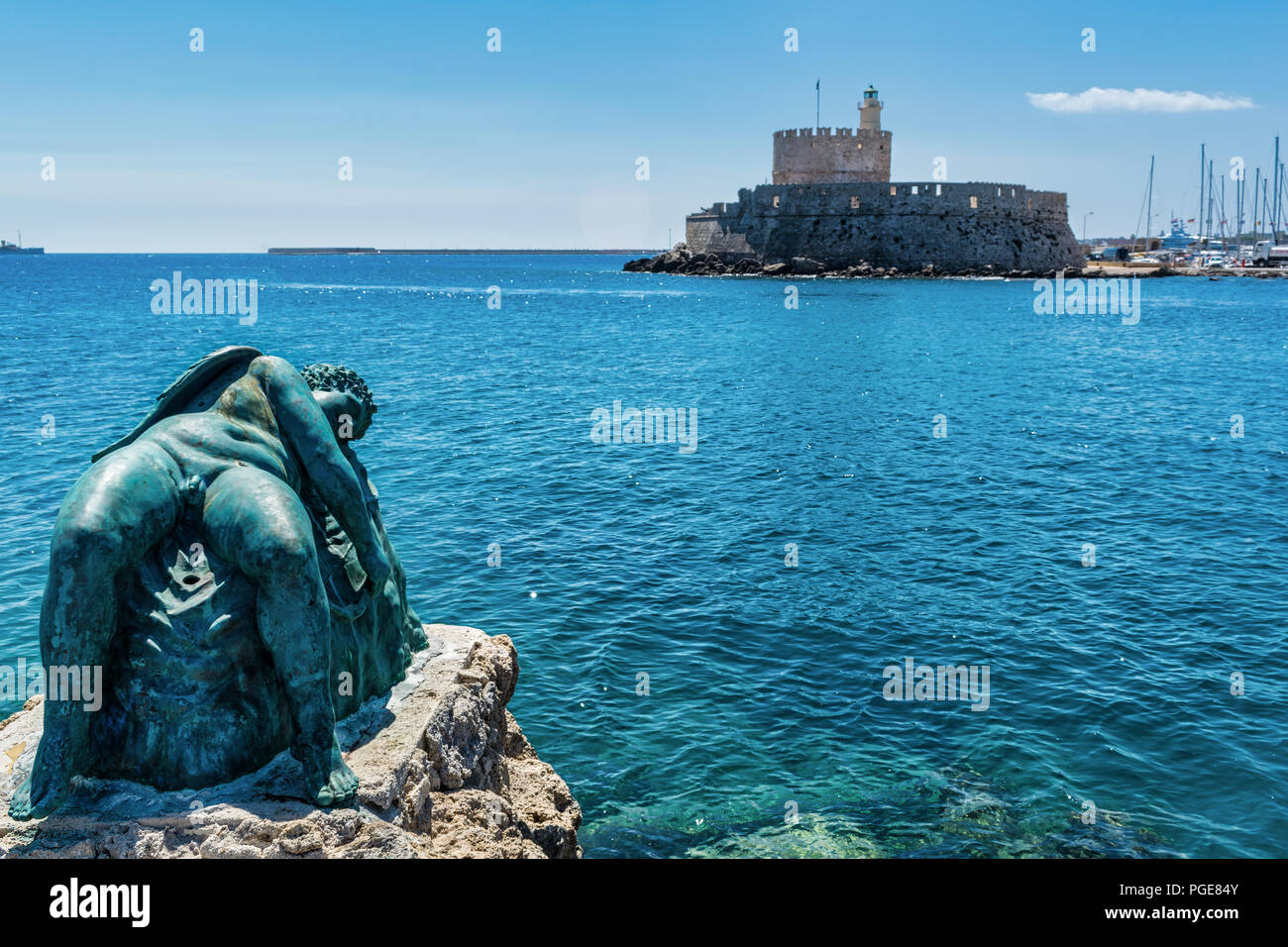This is a statue located on the rocks at the entrance to the old ...