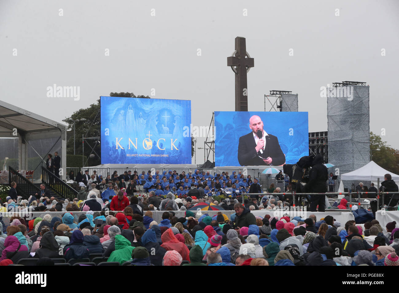 Pilgrims wait for the arrival of Pope Francis at Knock Holy Shrine, in ...