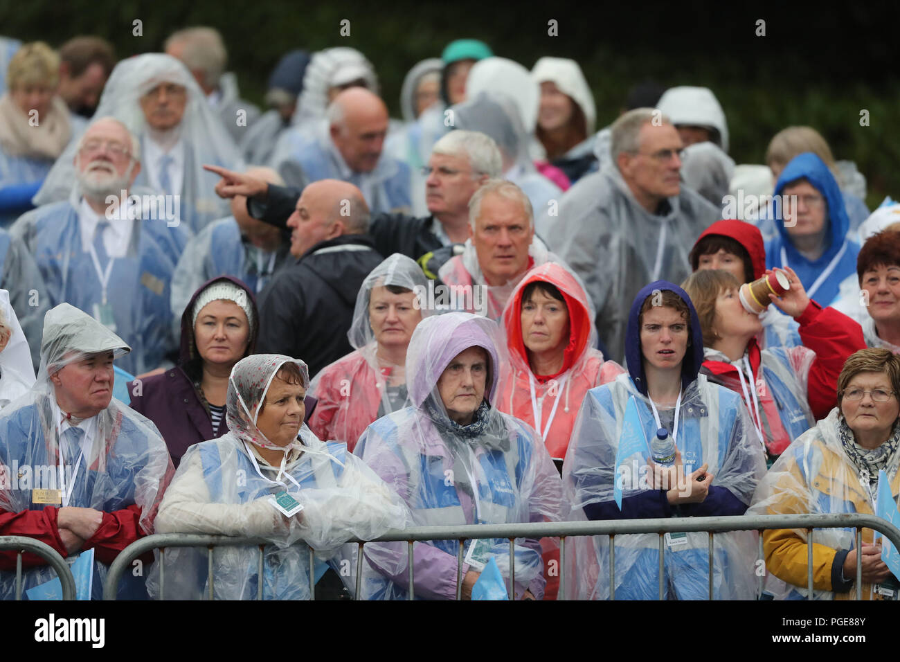 Pilgrims wait for the arrival of Pope Francis at Knock Holy Shrine, in ...