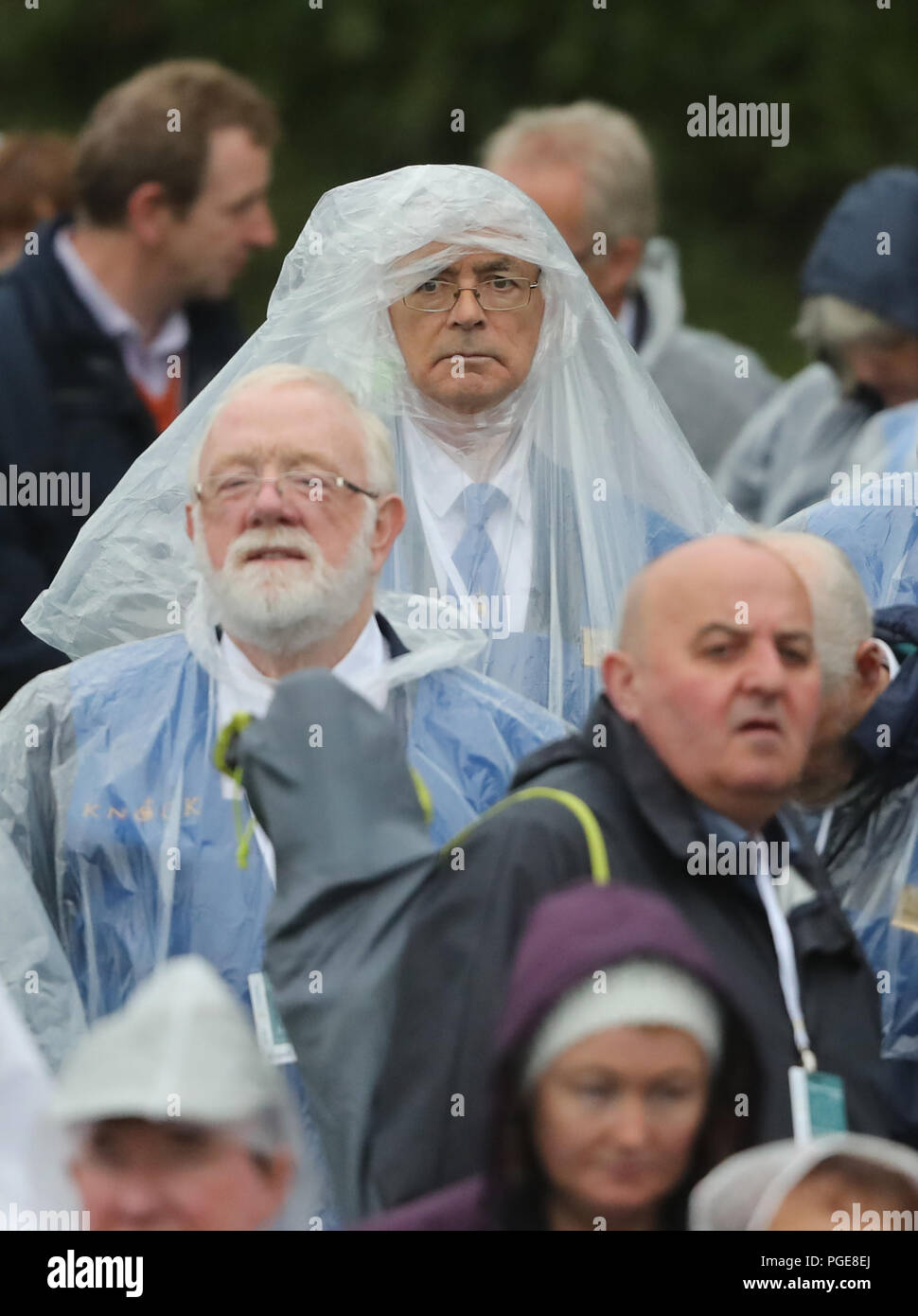 Pilgrims wait for the arrival of Pope Francis at Knock Holy Shrine, in ...