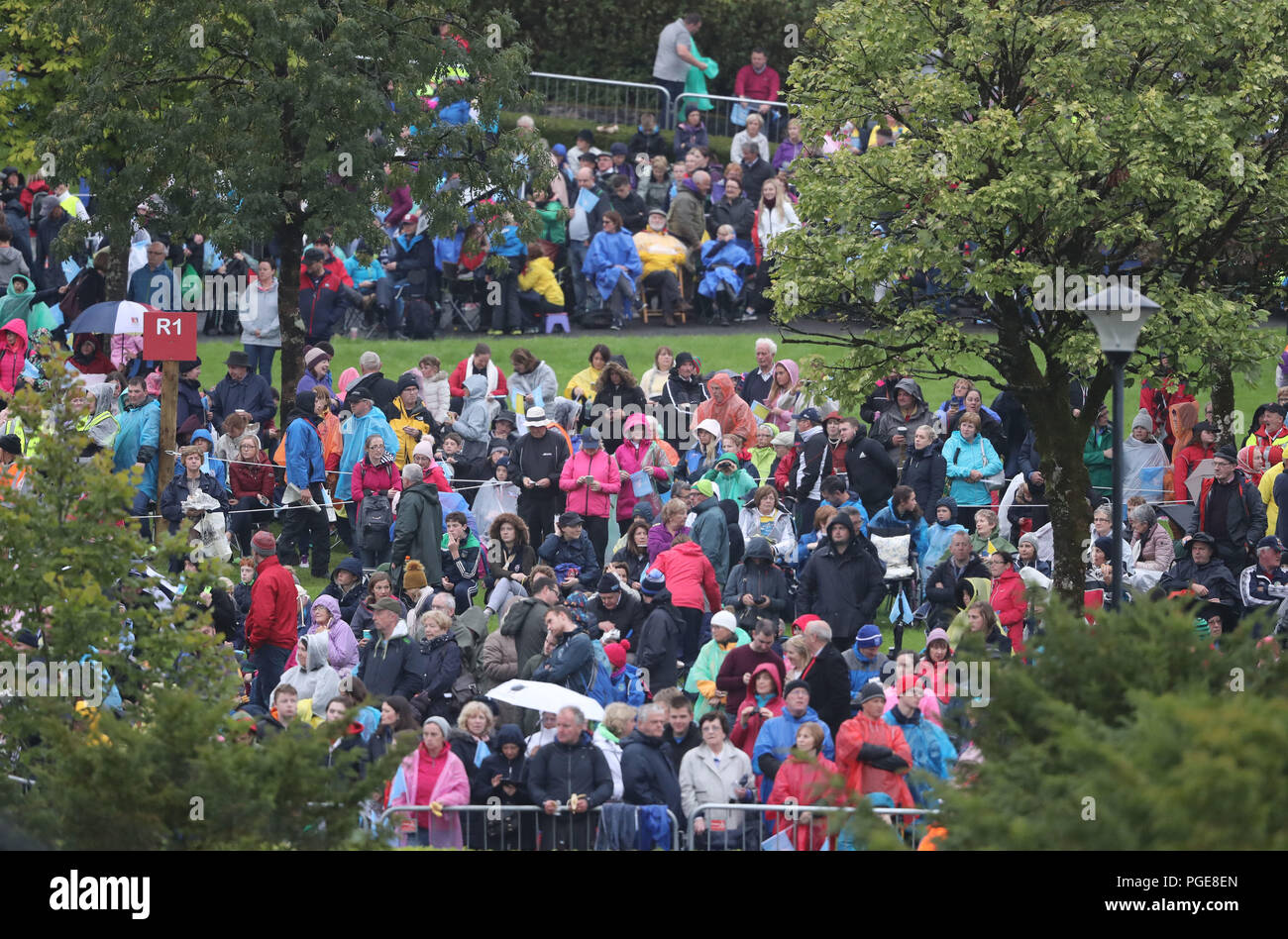 Pilgrims wait for the arrival of Pope Francis at Knock Holy Shrine, in ...