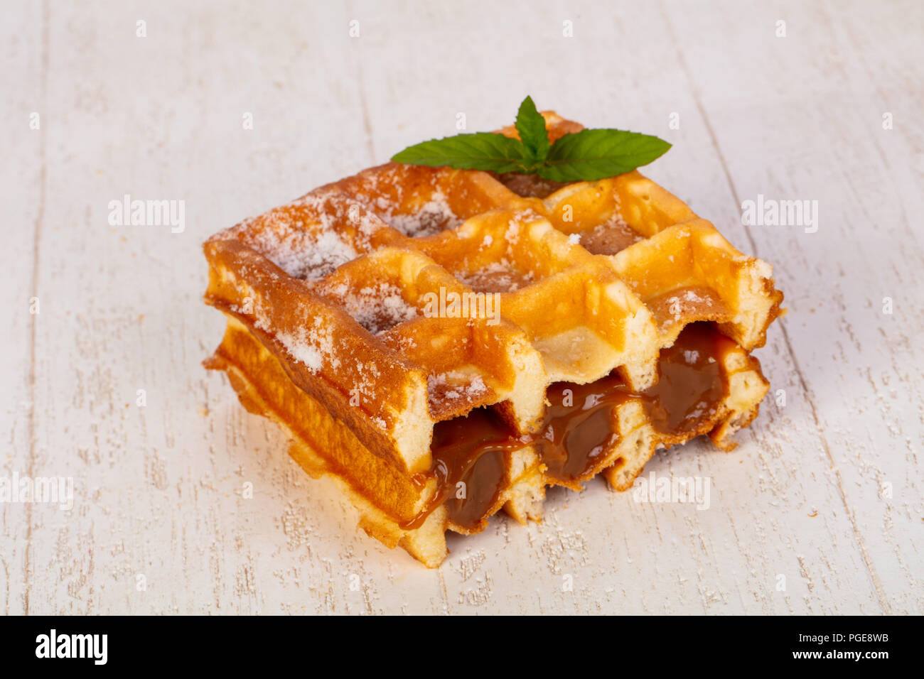 Sweet Waffle with berry jam Stock Photo - Alamy