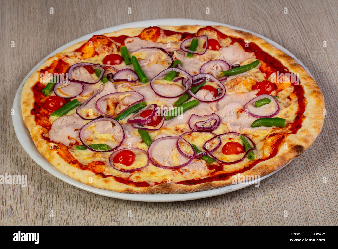 Pizza with ham and cheese Stock Photo - Alamy