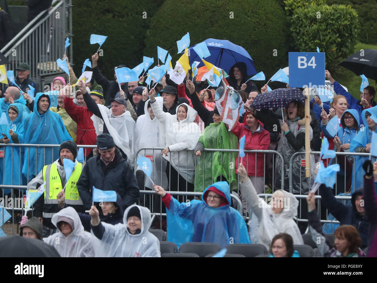 Pilgrims wait for the arrival of Pope Francis at Knock Holy Shrine, in ...