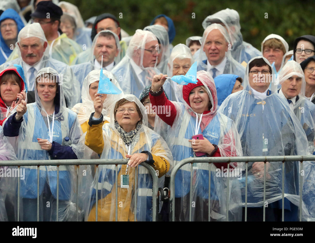 Pilgrims wait for the arrival of Pope Francis at Knock Holy Shrine, in ...