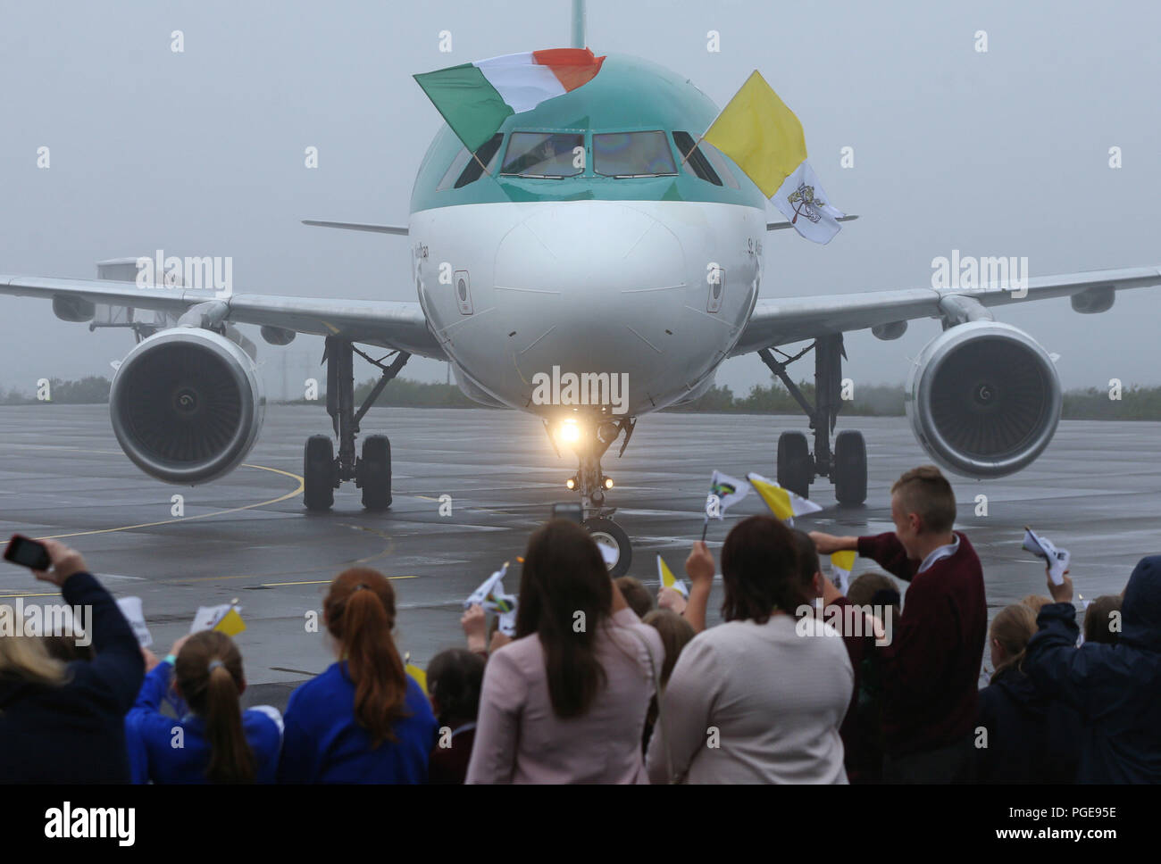 The plane carrying Pope Francis arrives at the airport in Knock in ...