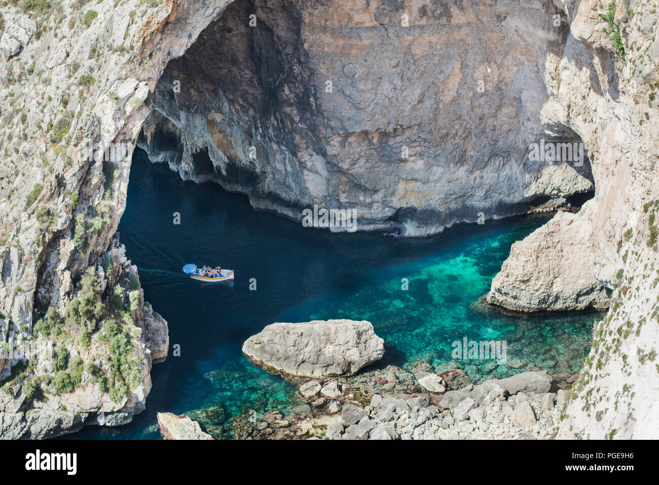 Blue Grotto, Malta. Crystal clear blue water coast of Malta. Summer ...