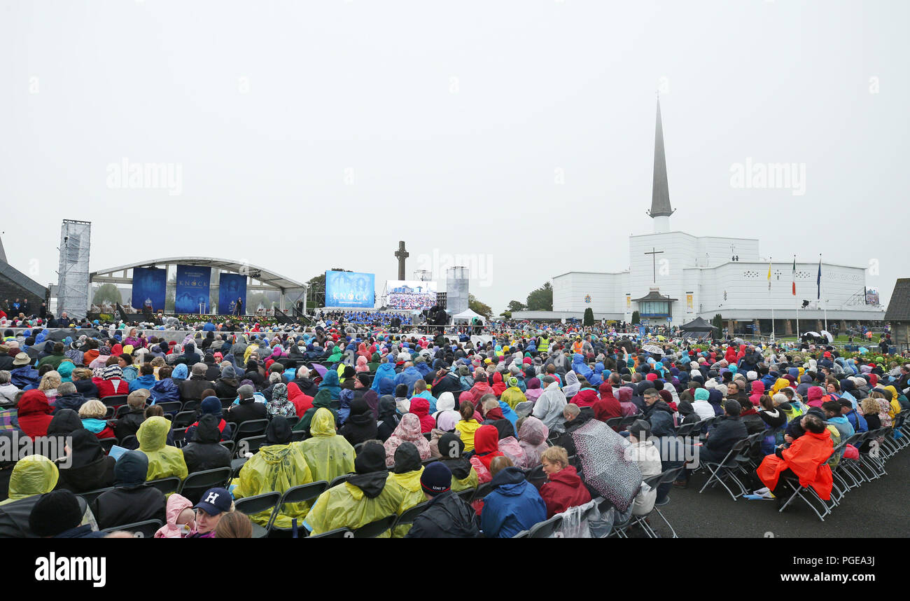 Crowds wait for Pope Francis during a visit to Knock Holy Shrine, in ...
