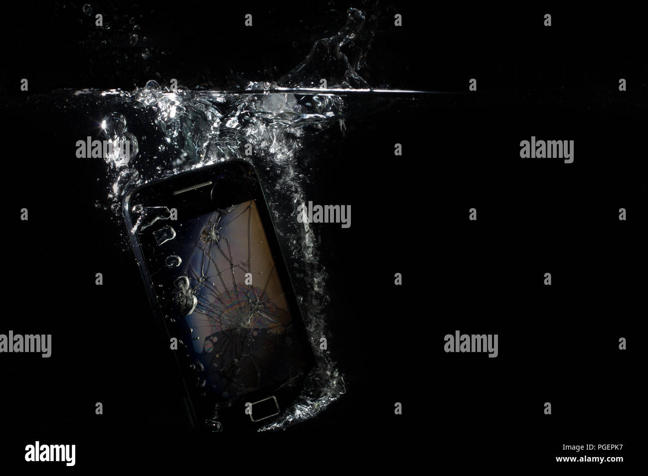Phone water splash hi-res stock photography and images - Alamy