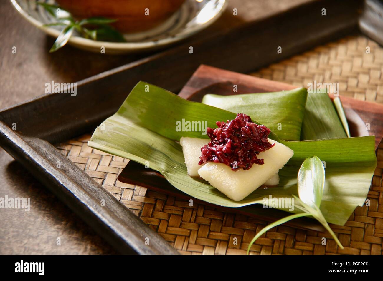 Tape Uli, the snack duo of fermented black glutinous rice (Tape) and ...