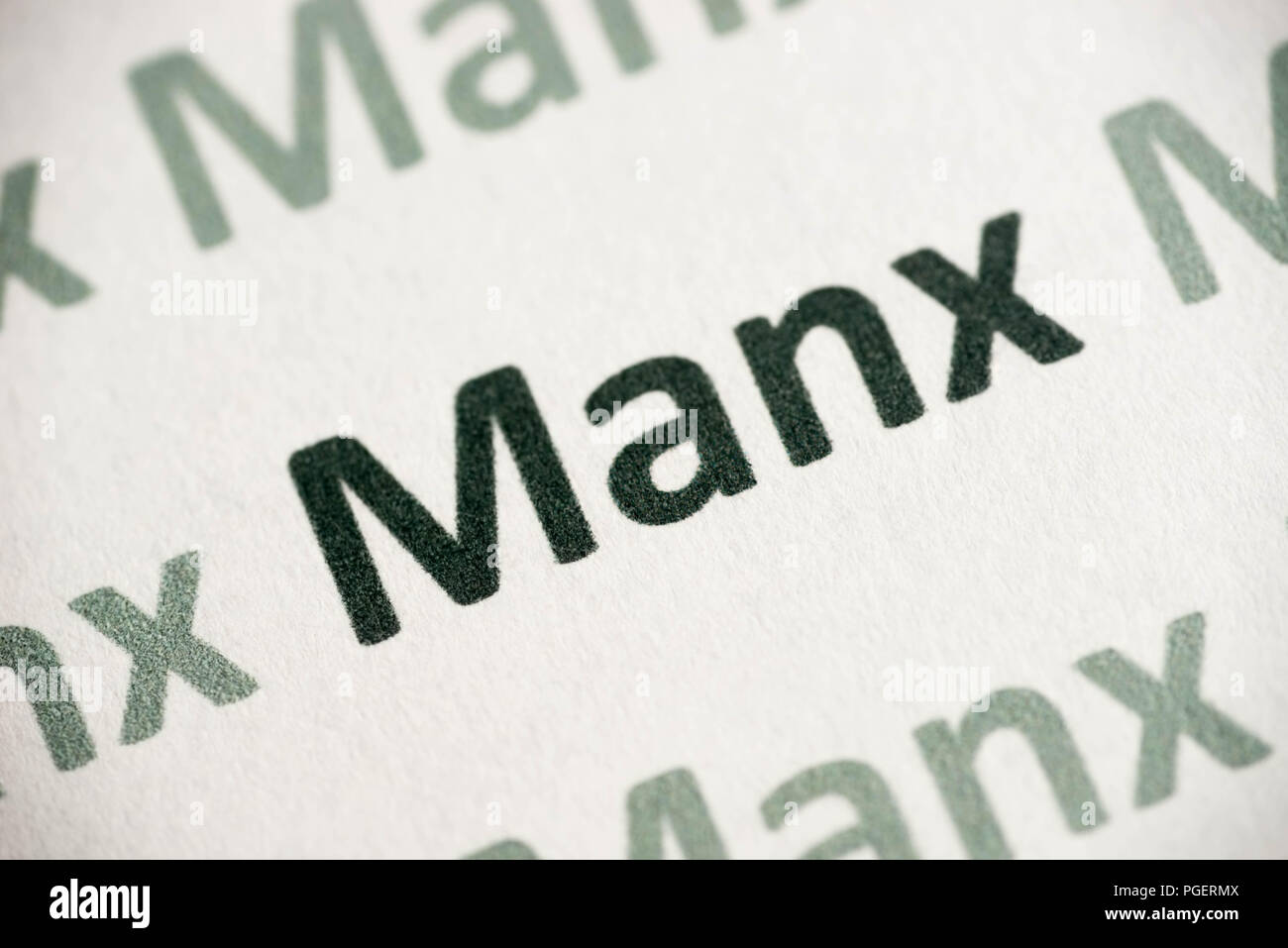 word Manx language printed on white paper macro Stock Photo - Alamy
