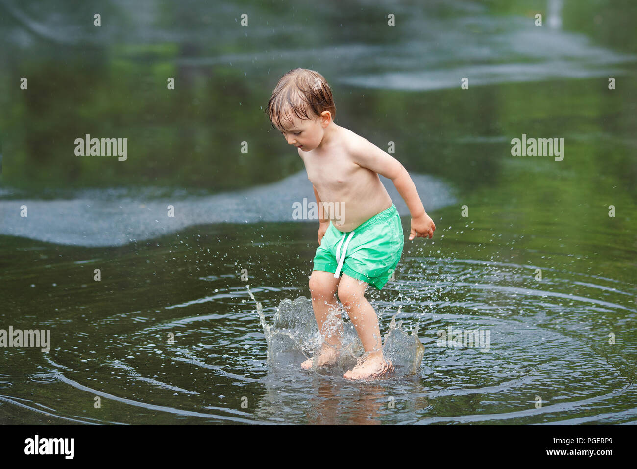 Jumping In Puddles High Resolution Stock Photography and Images - Alamy