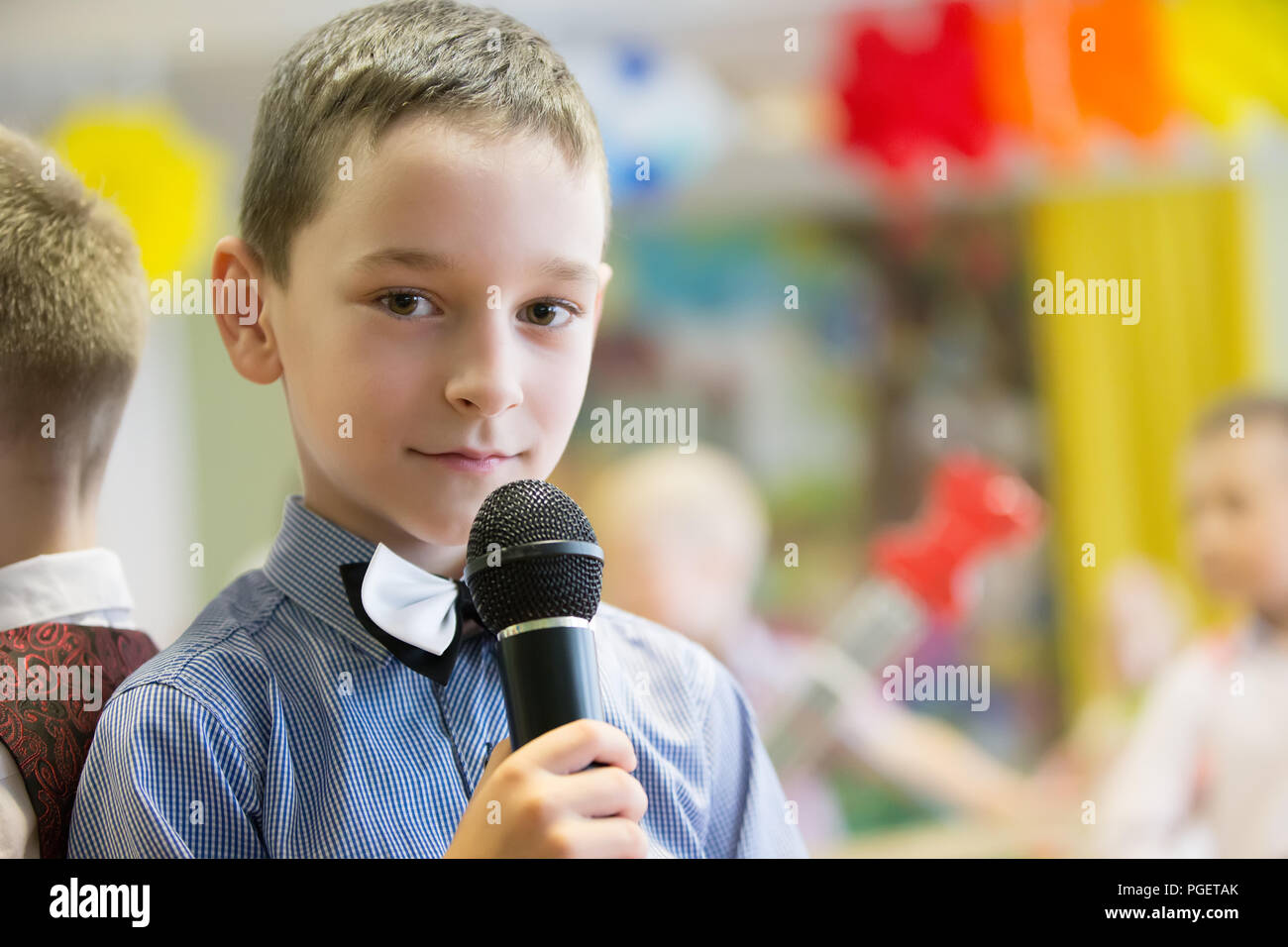 Kid speech mic hi-res stock photography and images - Alamy
