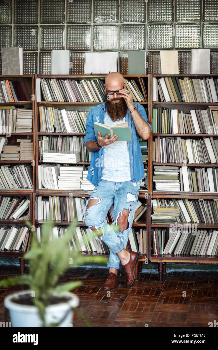 Bearded man reading book hi-res stock photography and images - Alamy