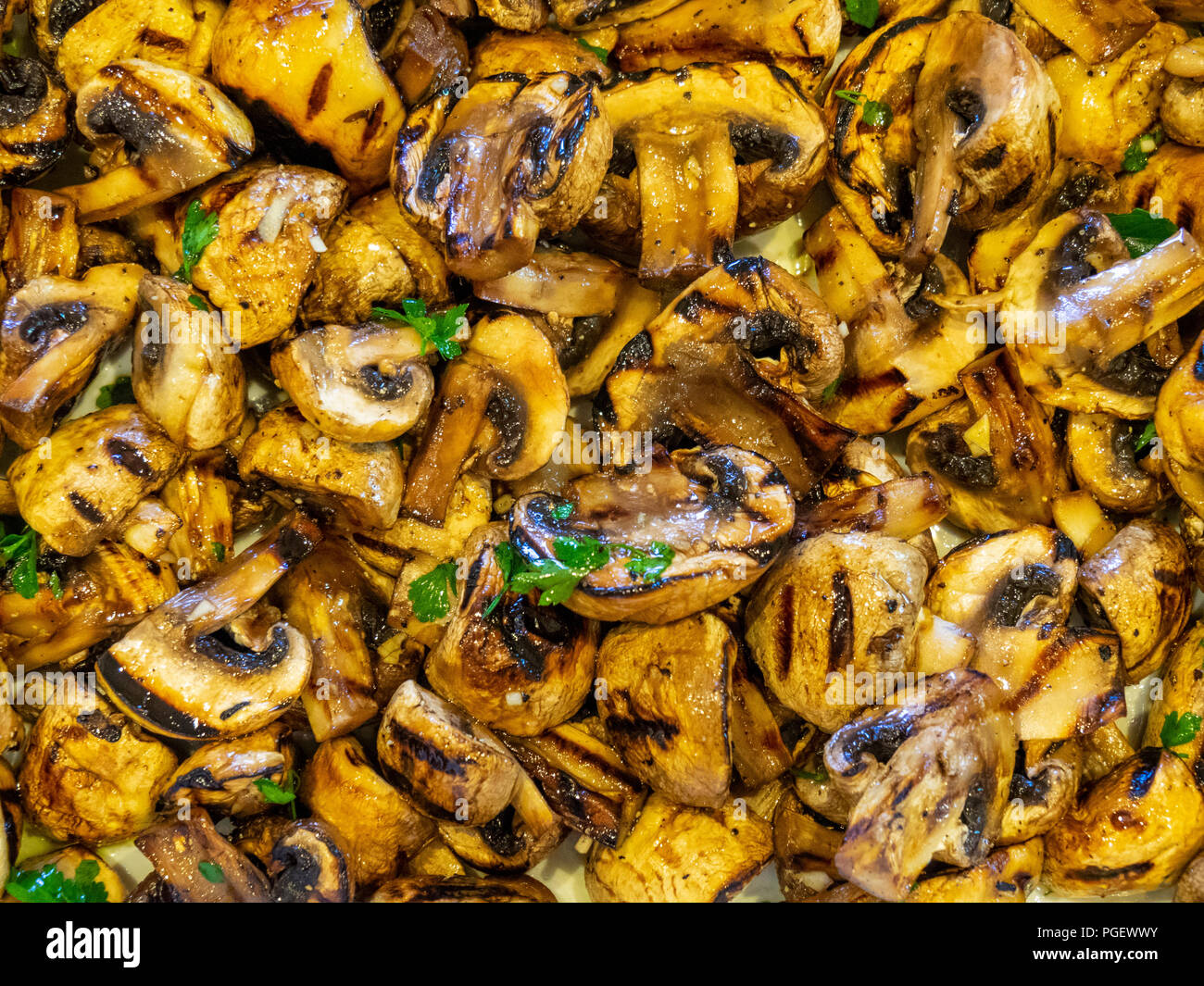 Grilled sliced mushrooms Stock Photo - Alamy