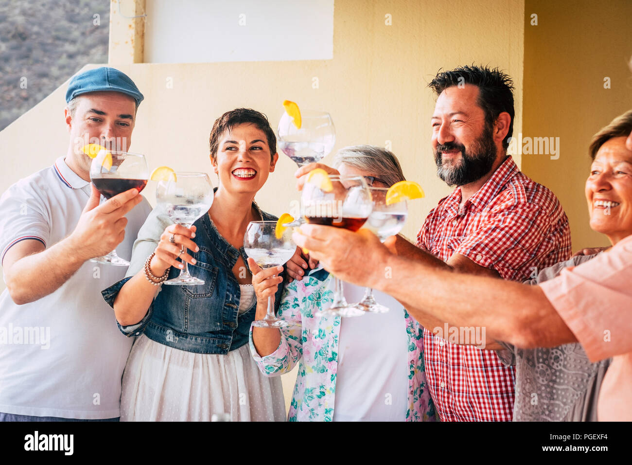 mixed ages group of caucasian people having fun together celebrating an ...