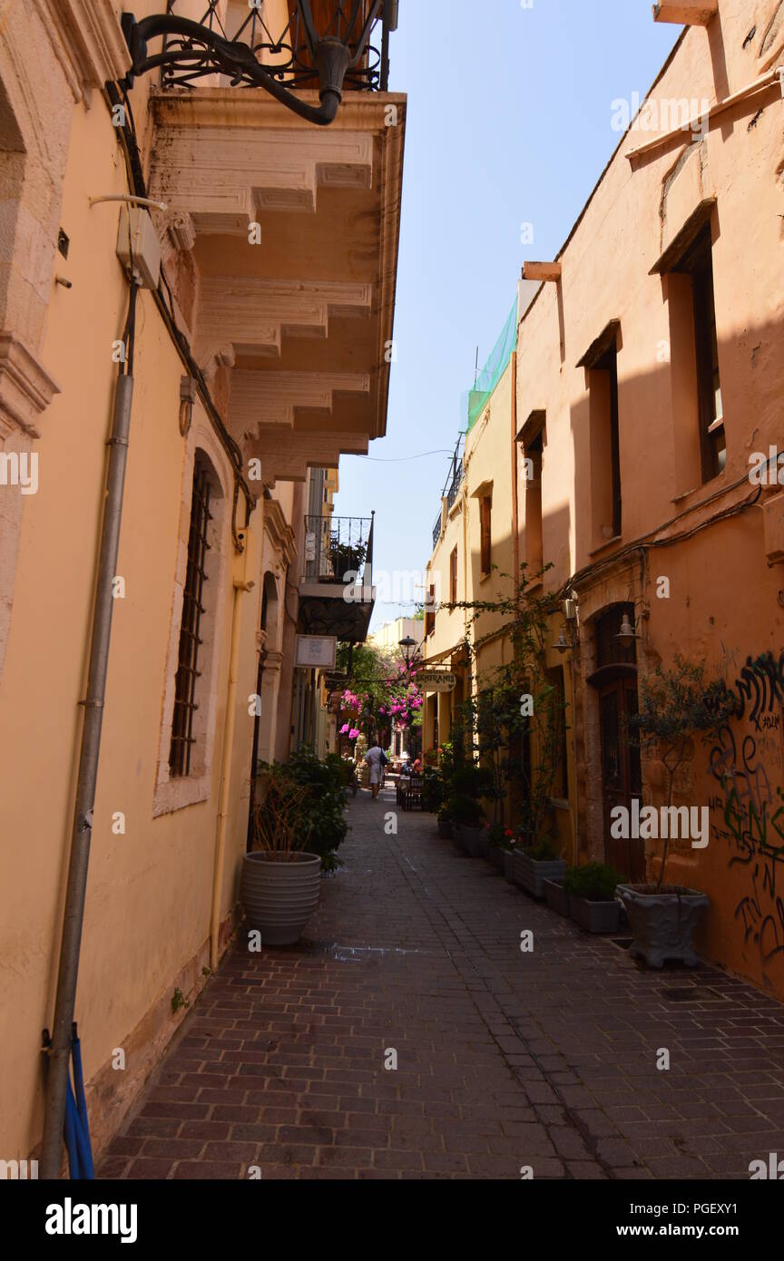 Very Narrow Streets With Beautiful And Colorful Buildings In Chania ...