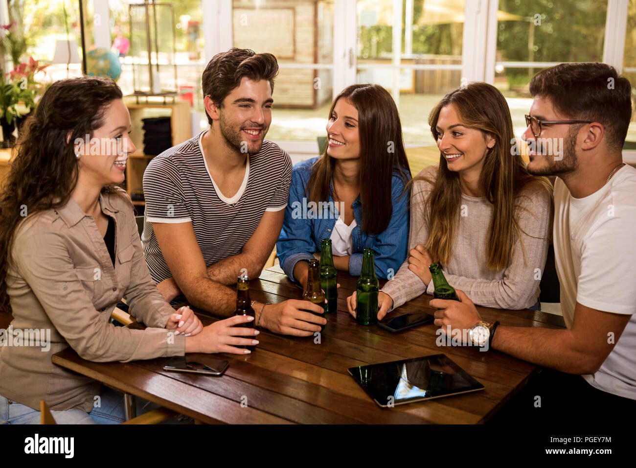 Group drinking at bar hi-res stock photography and images - Alamy