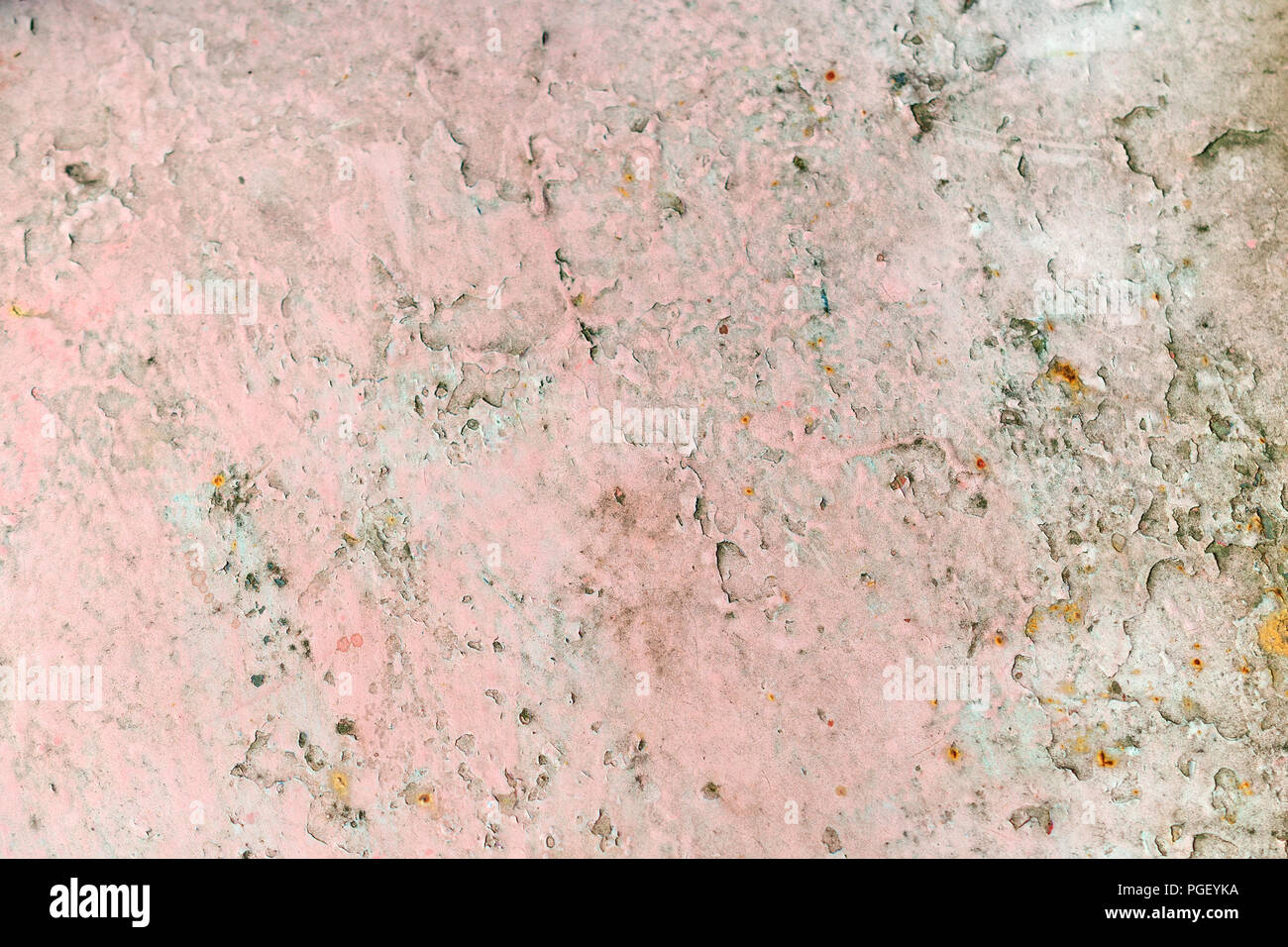 Light pink painted surface. Abstract background of old paint. Close-up ...
