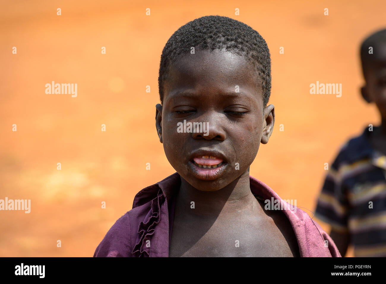 GHANI, GHANA - JAN 14, 2017: Unidentified Ghanaian the little boy shows ...