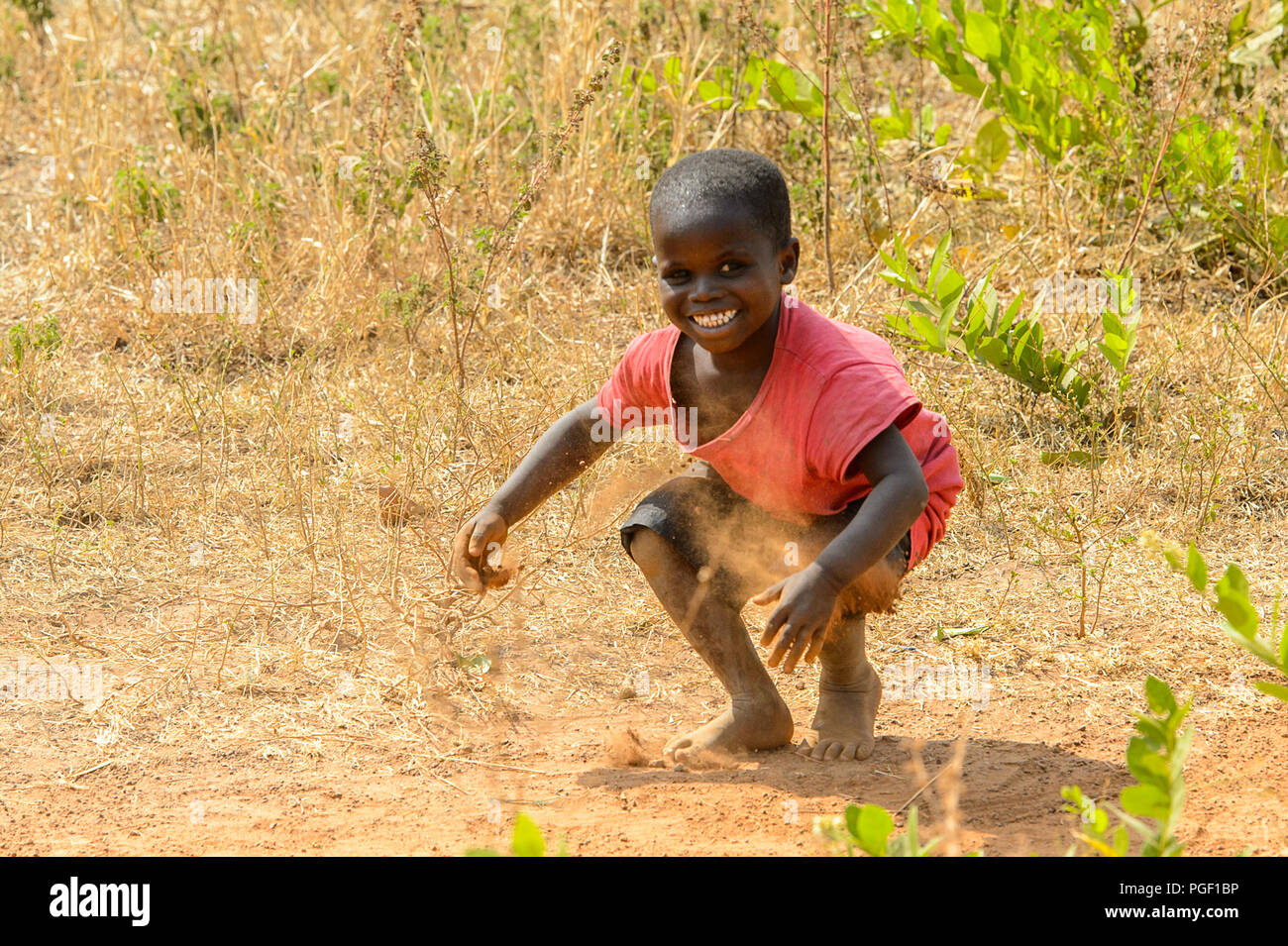 Boy sat down hi-res stock photography and images - Alamy