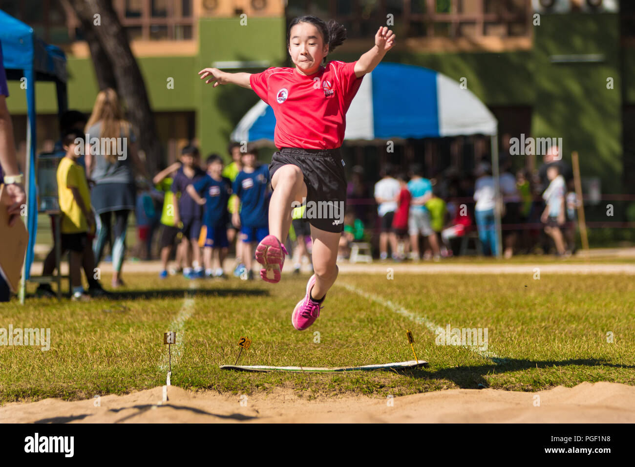 CHIANG MAI, THAILAND - 29 January 2018 - School girl athlete jump up ...