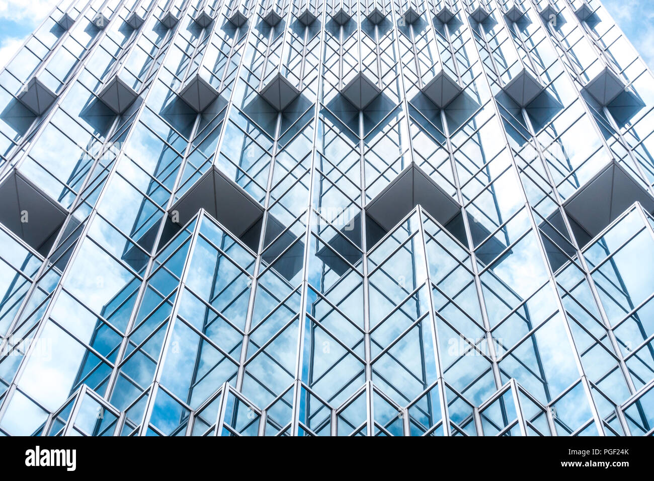 underside panoramic and perspective view to steel blue glass high rise ...