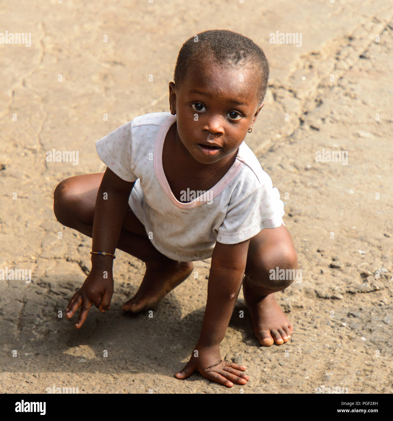 ACCRA, GHANA - JAN 8, 2017: Unidentified Ghanaian little girl in dirty ...