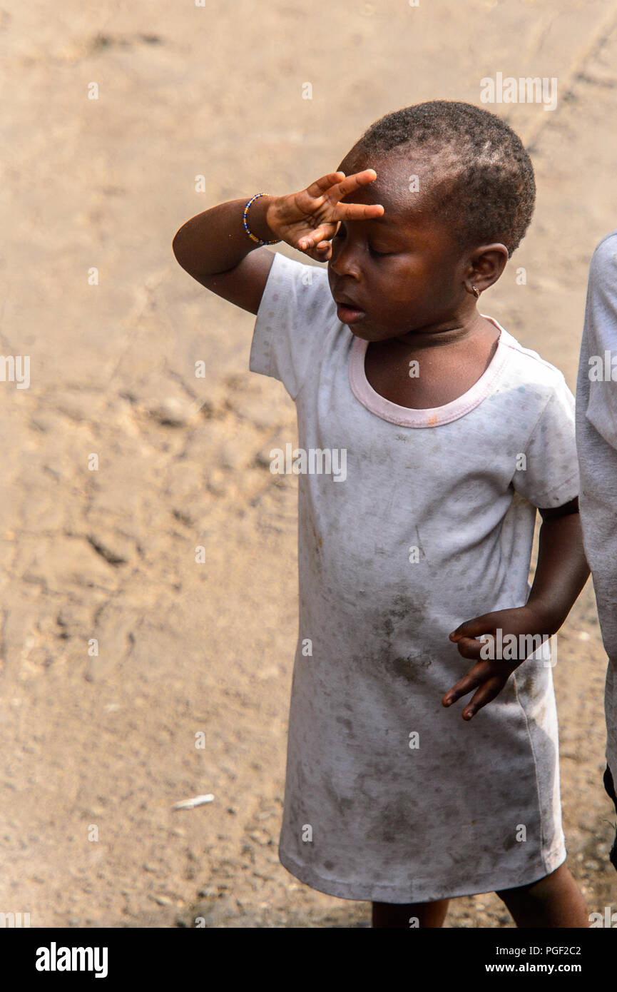 ACCRA, GHANA - JAN 8, 2017: Unidentified Ghanaian little girl in dirty ...