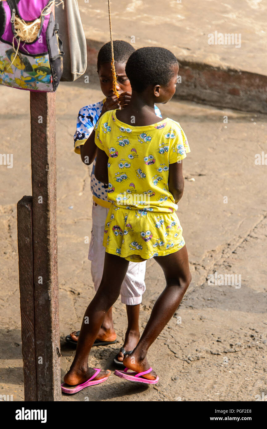 ACCRA, GHANA - JAN 8, 2017: Unidentified Ghanaian little girl in yellow ...