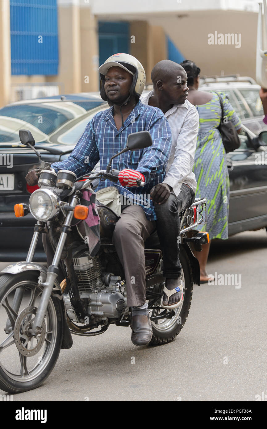 Two people on a motocycle hi-res stock photography and images - Alamy