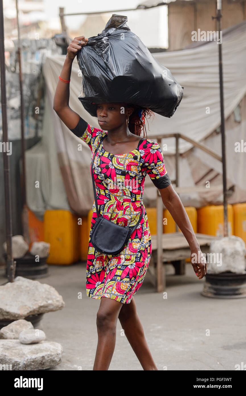 Woman carries plastic bag on hi-res stock photography and images - Alamy