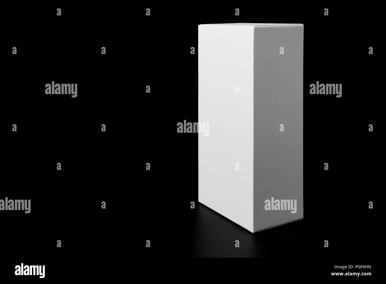 white box isolated on black background close up Stock Photo - Alamy