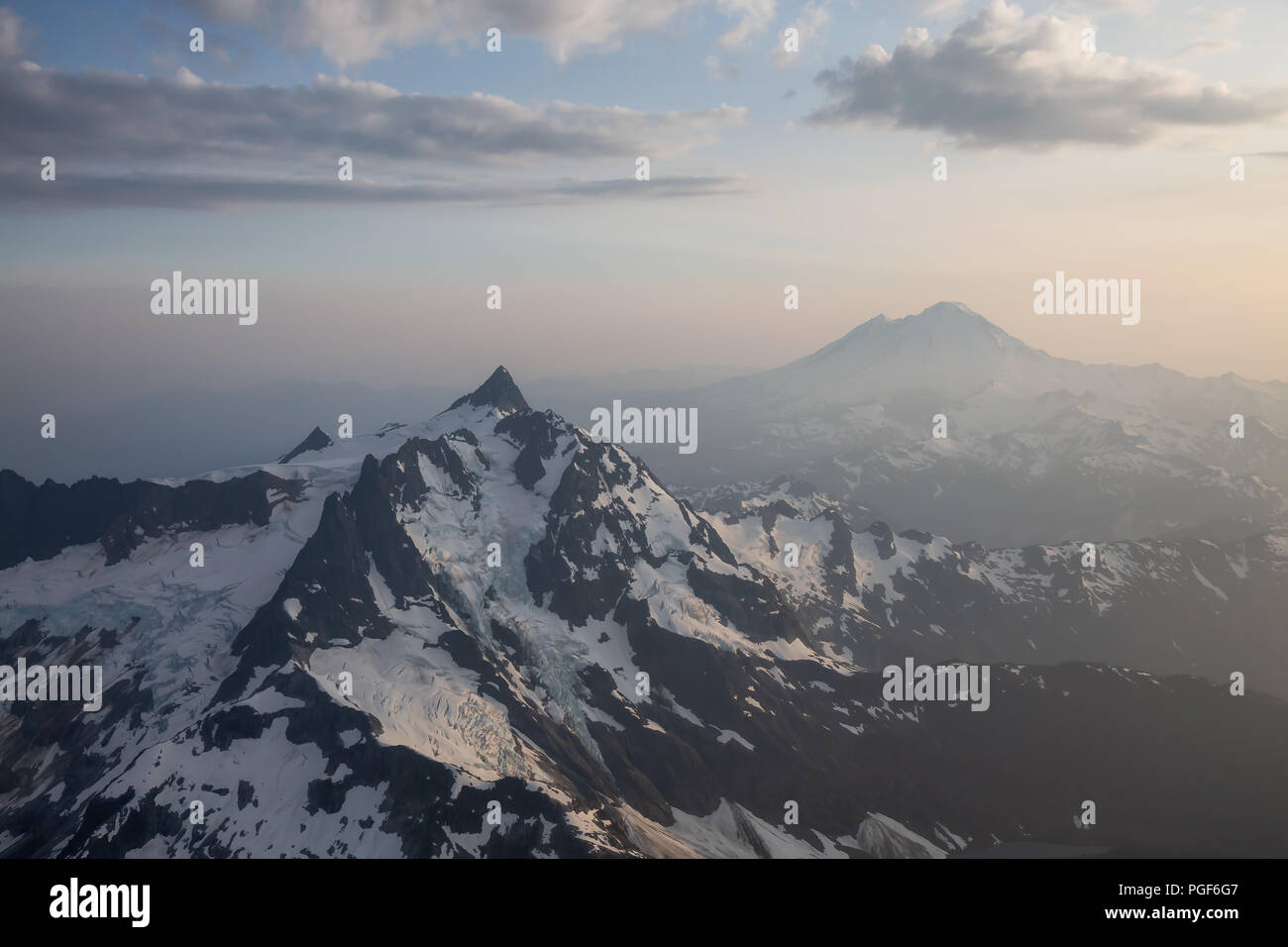 Aerial landscape view of the rugged mountain peaks with Mount Baker in ...
