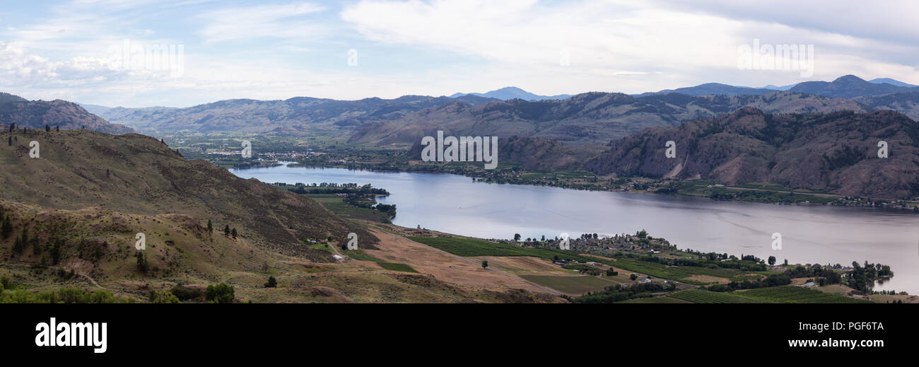 Aerial panoramic landscape view of Osoyoos Lake during a cloudy summer ...