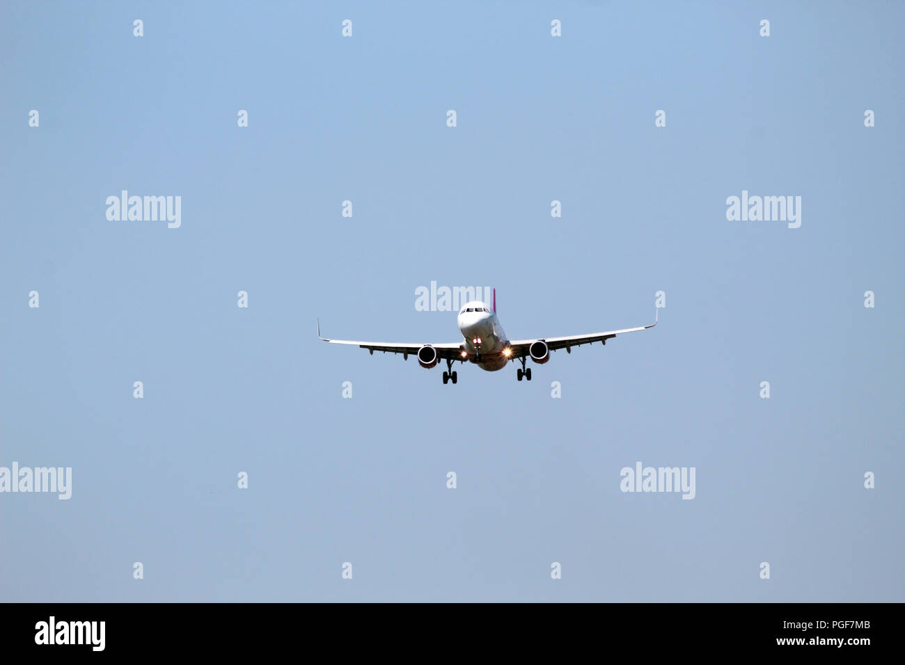Airplane is ready for landing Stock Photo - Alamy