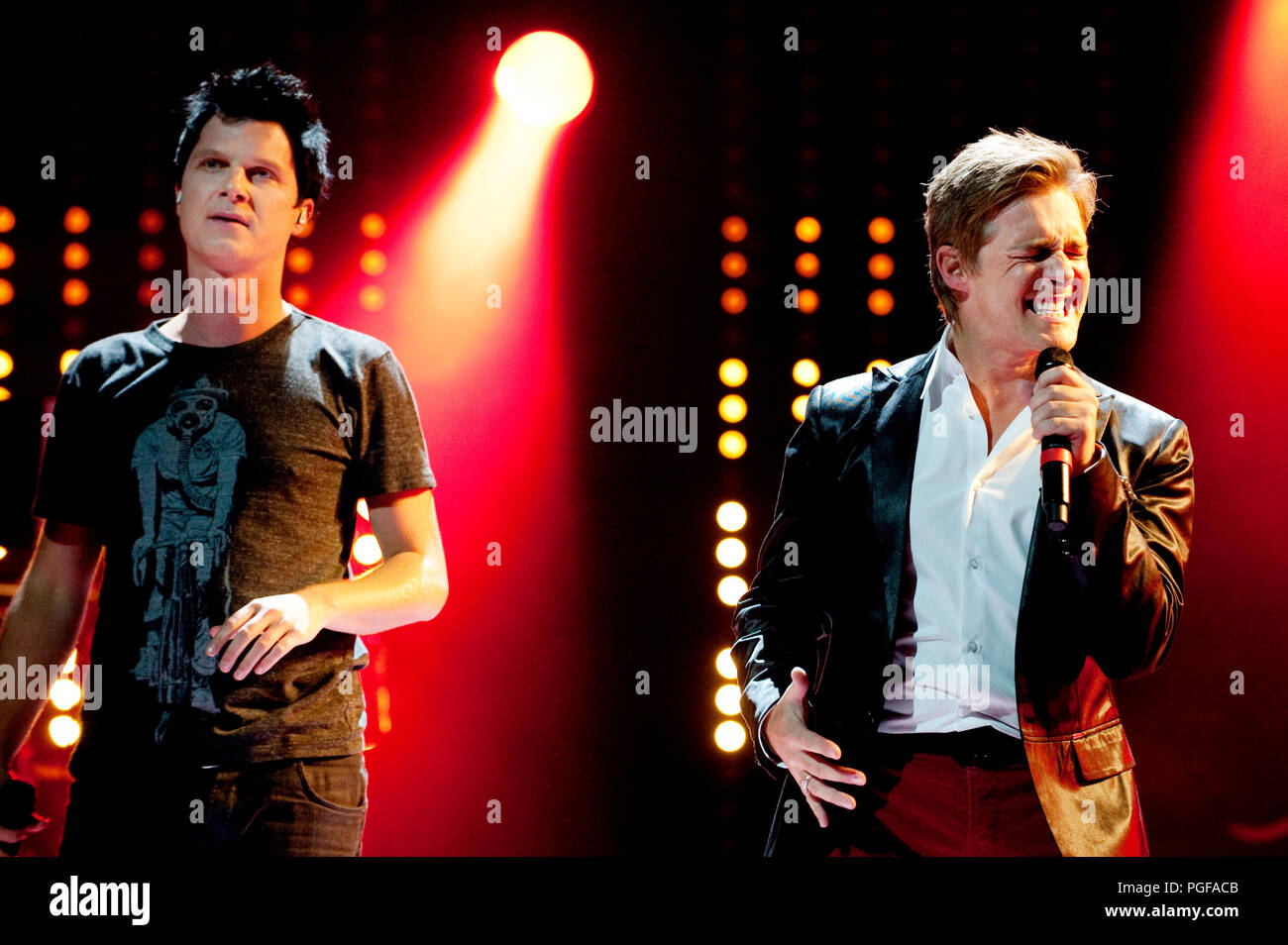 Flemish schlager singer Christoff singing with rock singer Koen Buyse ...