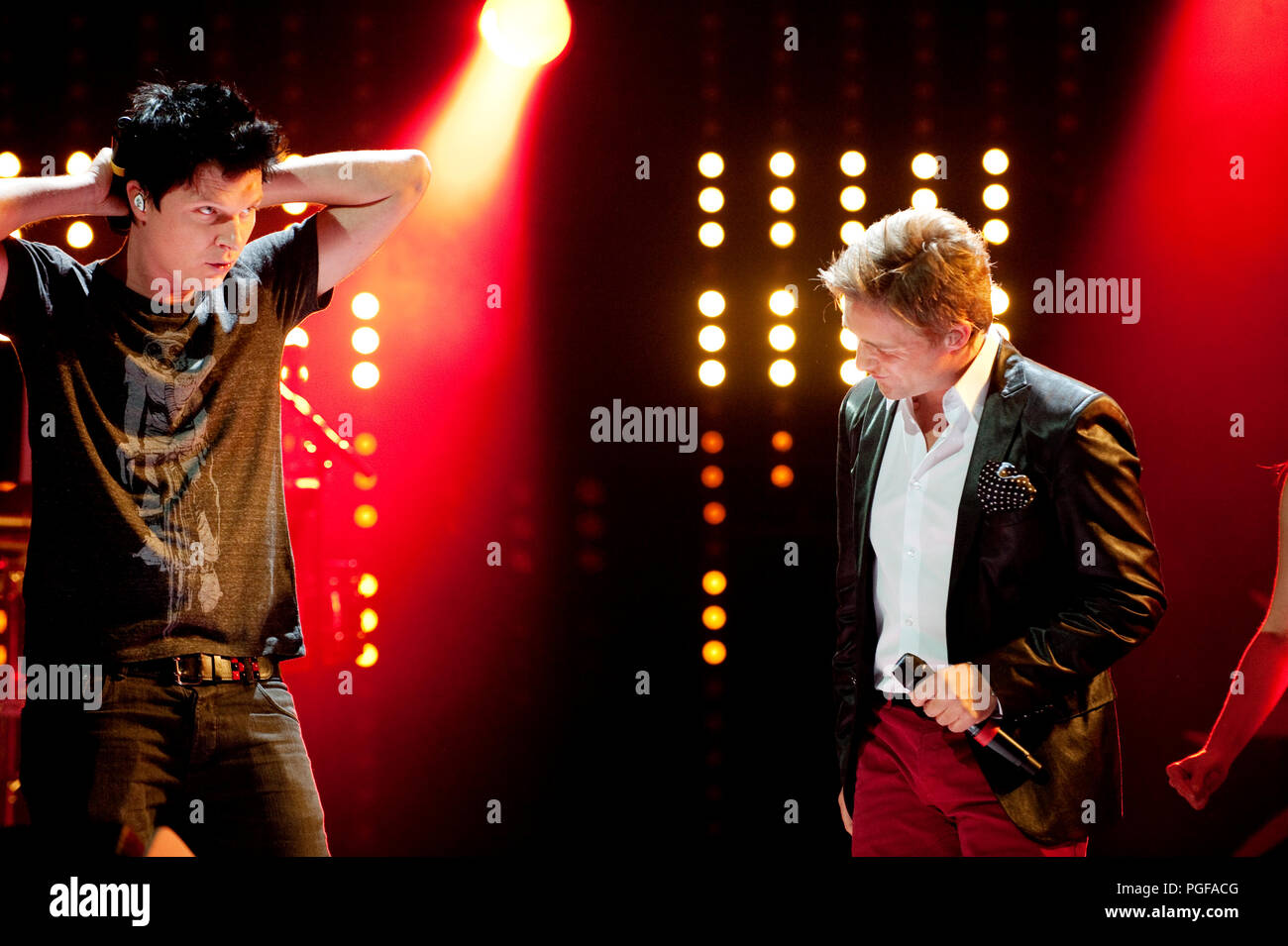 Flemish schlager singer Christoff singing with rock singer Koen Buyse ...