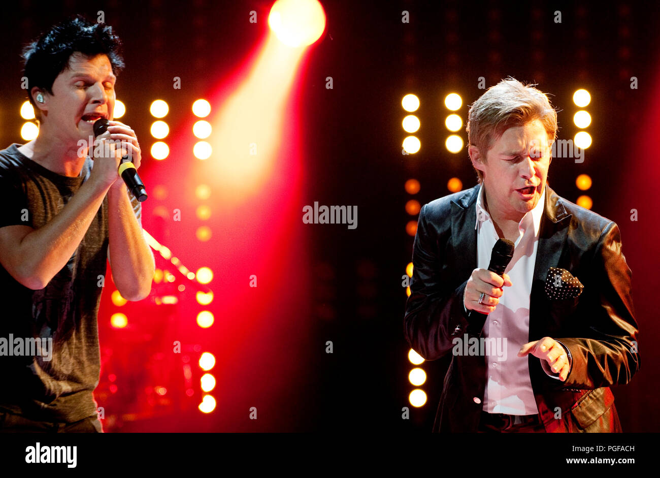 Flemish schlager singer Christoff singing with rock singer Koen Buyse ...