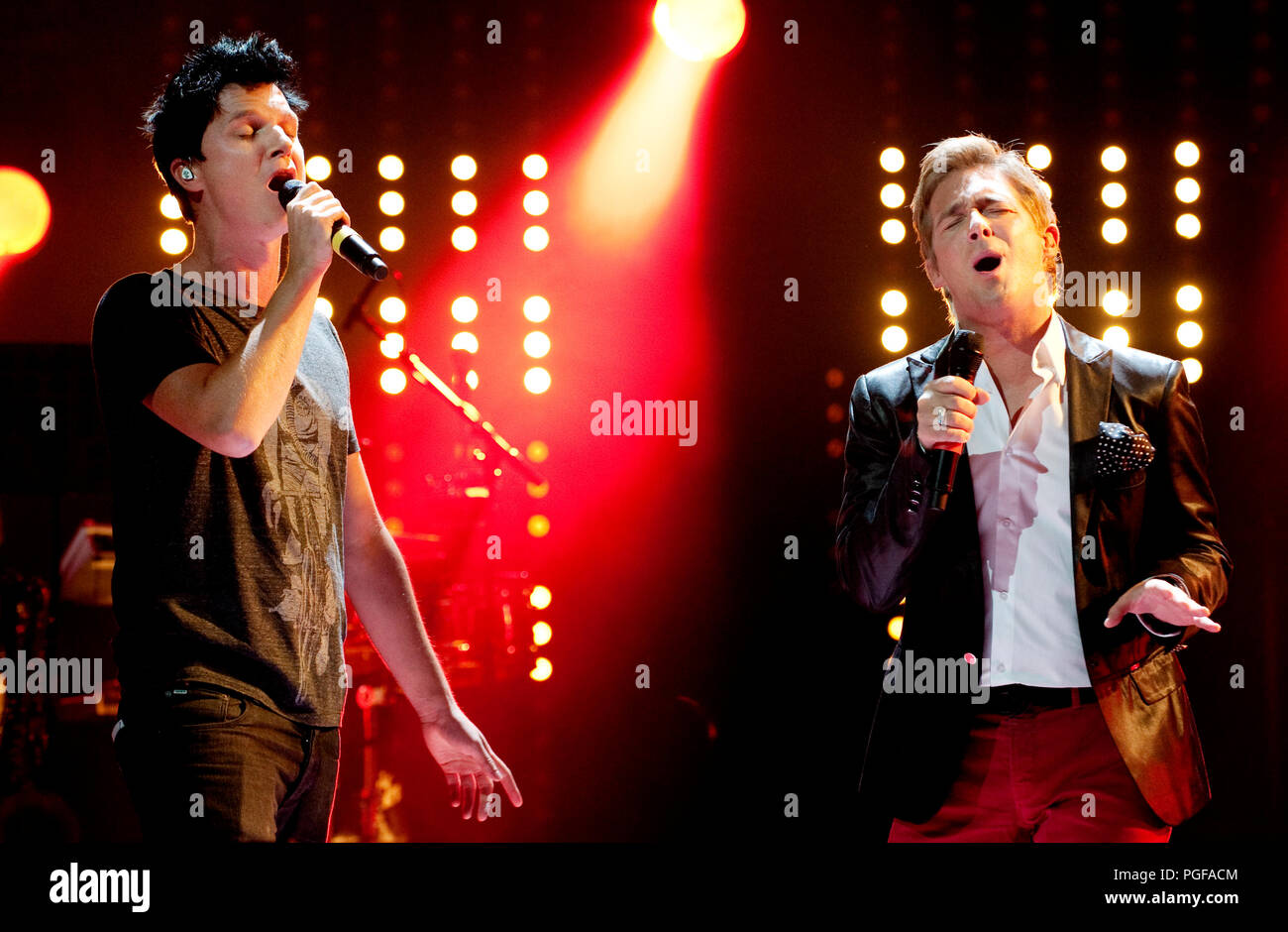 Flemish schlager singer Christoff singing with rock singer Koen Buyse ...