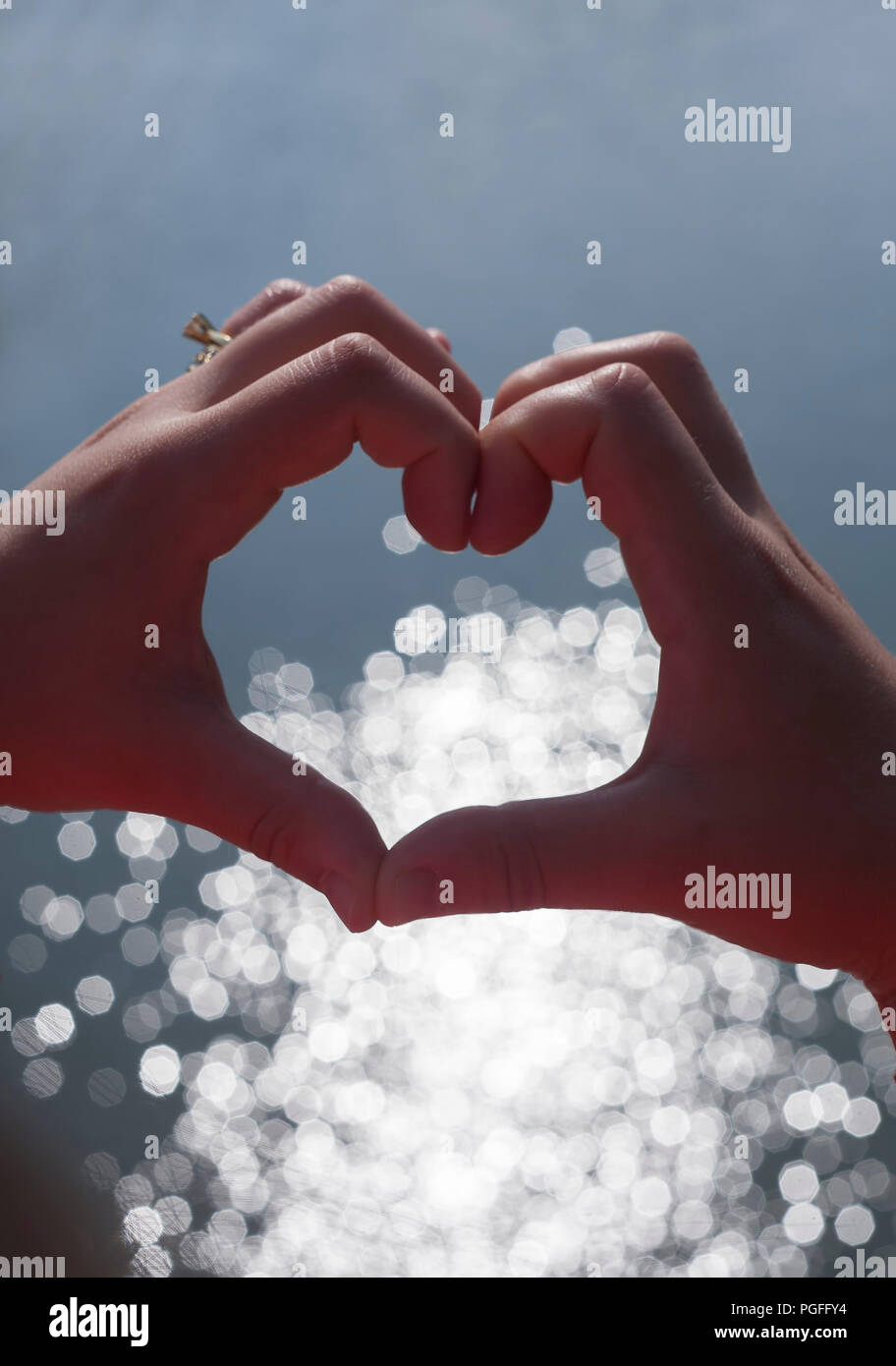 hands making a heart shape Stock Photo - Alamy