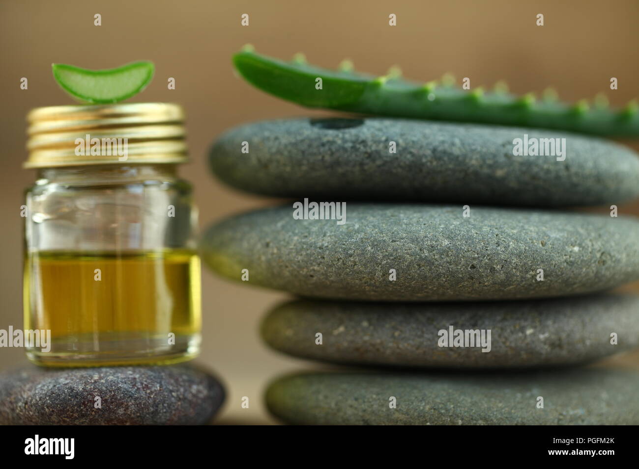 aloe oil spa therapy wood background Stock Photo - Alamy