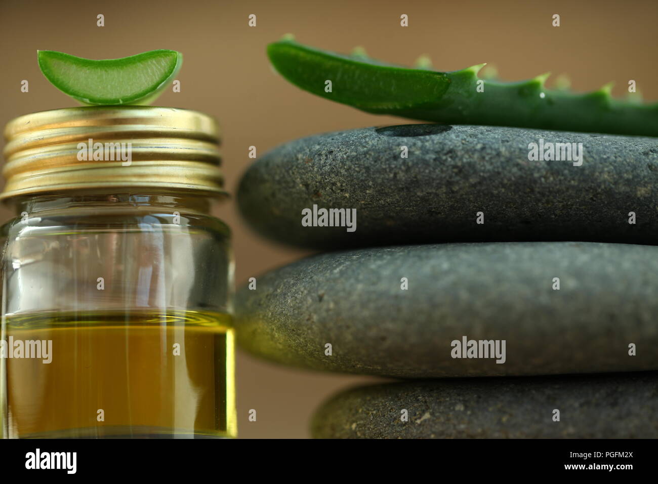 aloe oil spa therapy wood background Stock Photo - Alamy