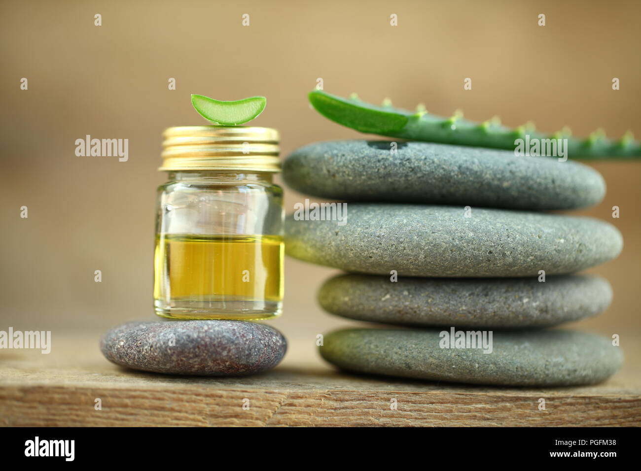 aloe oil spa therapy wood background Stock Photo - Alamy