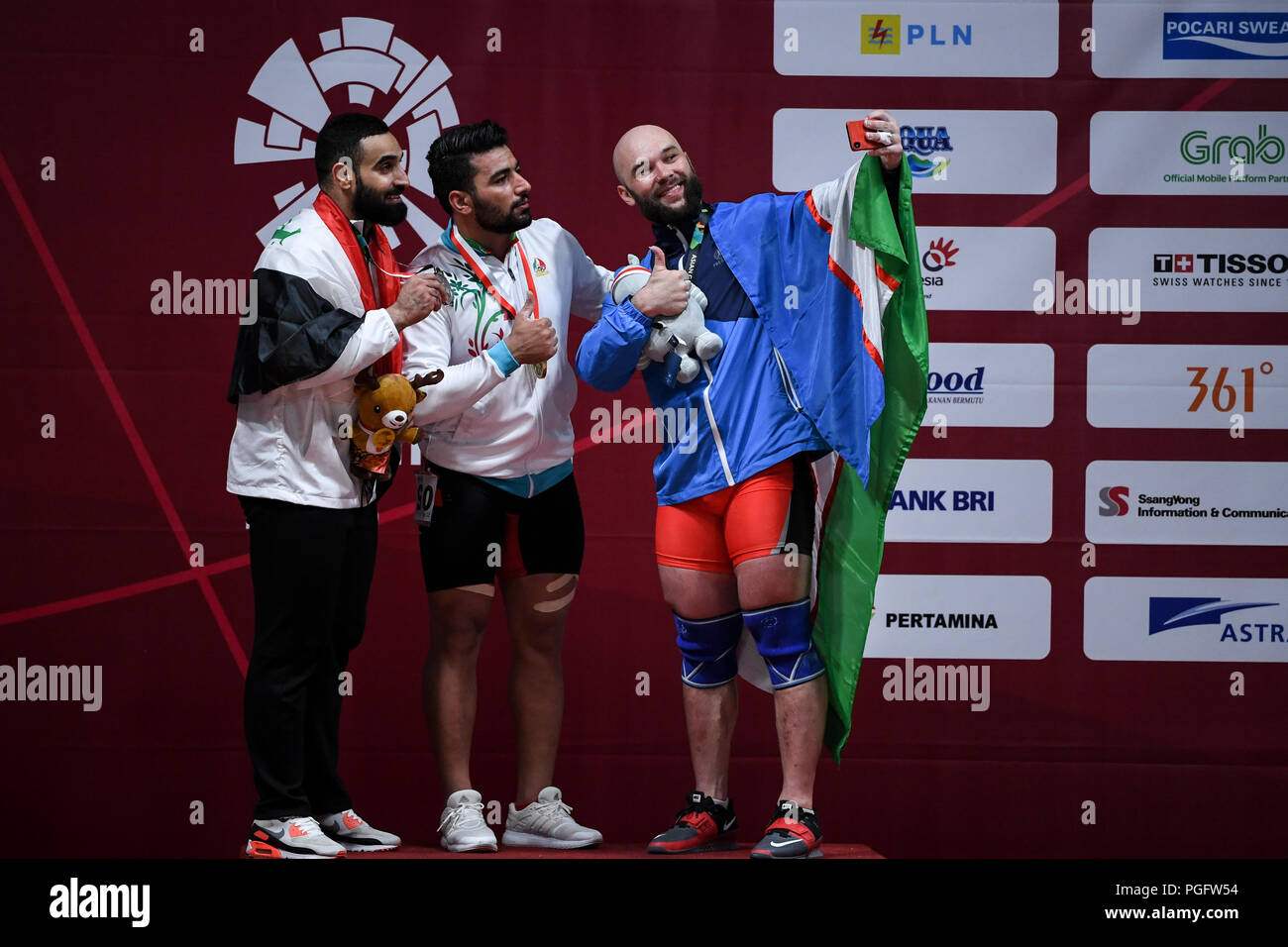 Jakarta, Indonesia. 26th Aug, 2018. Gold medalist Ruslan Nurudinov (R ...
